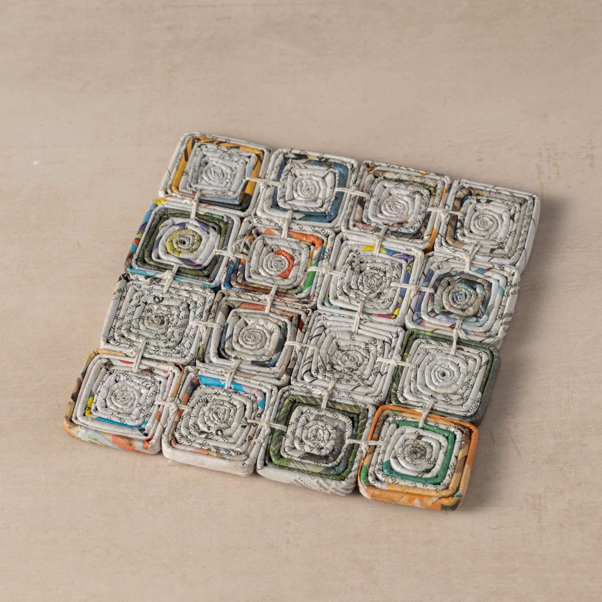 Read All About It Recycled Newspaper Trivet | Ten Thousand Villages